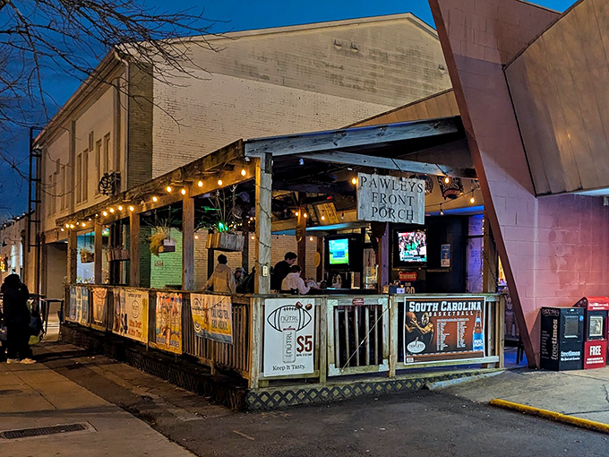 Twilight transforms Pawleys Front Porch into a beacon of burger bliss, with string lights creating that "come on in, the calories are worth it" ambiance.