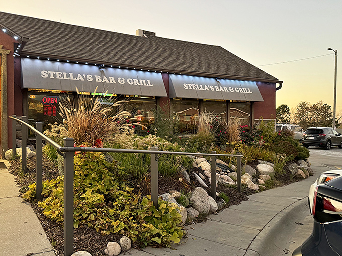Stella's exterior welcomes you with prairie-style landscaping and a modest facade that belies the burger magnificence waiting inside.