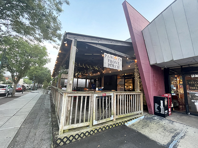 Twilight transforms Pawleys Front Porch into a beacon of burger bliss, with string lights creating that "come on in, the calories are worth it" ambiance.