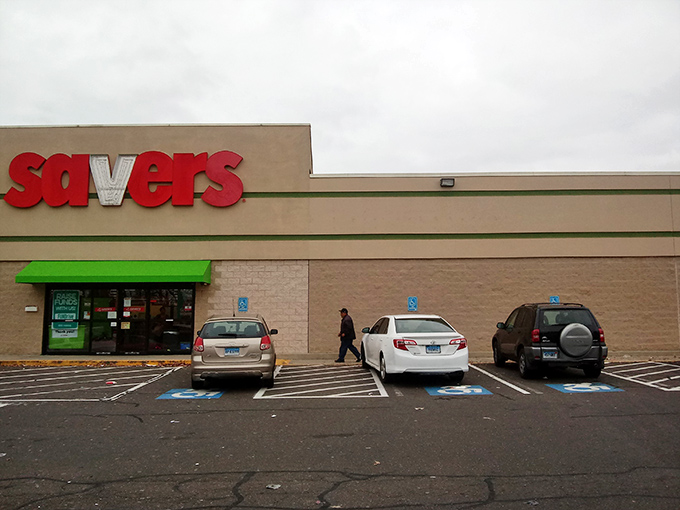 The iconic red Savers sign beckons like a lighthouse for bargain hunters. This unassuming exterior houses treasures waiting to be discovered by savvy Connecticut shoppers.