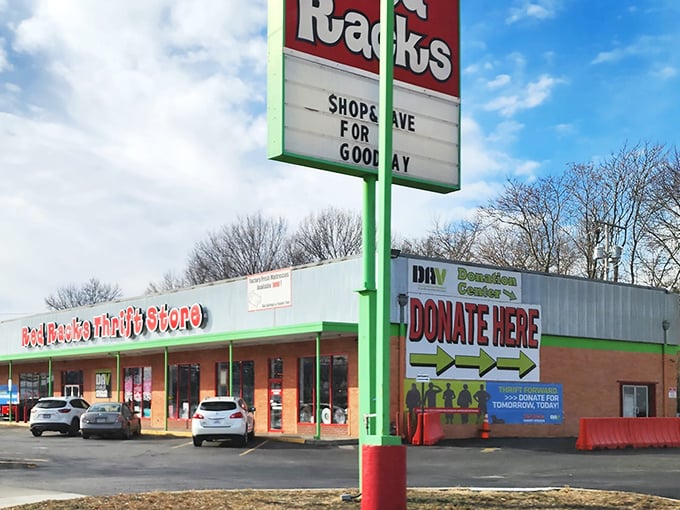 The bright red signage promises treasure within these walls, where bargain hunters and do-gooders unite in the pursuit of secondhand glory. 