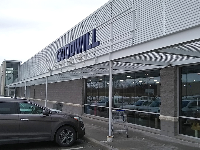 The modern exterior of Goodwill on 72nd Street beckons like a department store, but inside awaits a treasure hunt where every purchase helps the community.
