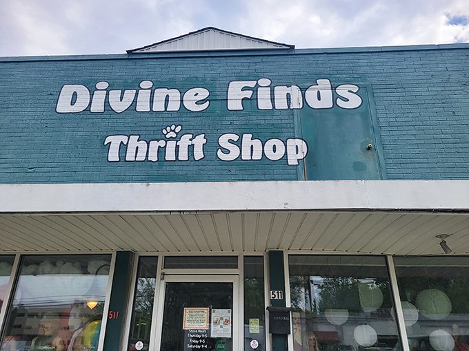 The teal storefront of Divine Finds stands like a portal to another era, inviting treasure hunters to step through and begin their journey. 