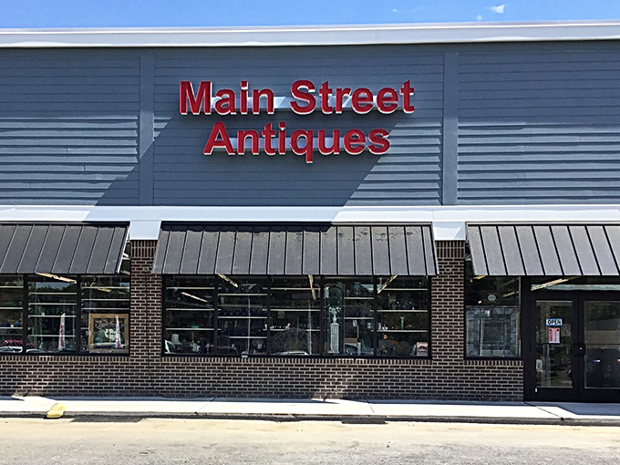 The unassuming storefront hides a universe of treasures within. Like finding a portal to the past behind that bold red signage.