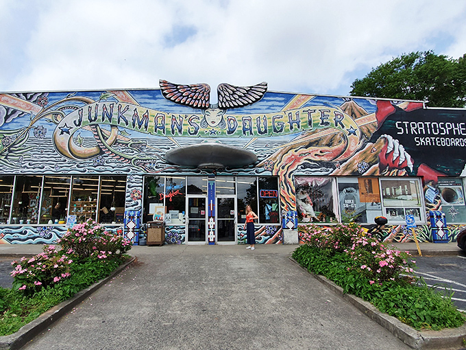 The psychedelic facade of Junkman's Daughter looks like what would happen if Salvador Dal&iacute; designed a retail store. Wings, hands, and cosmic imagery announce: normal stuff definitely not sold here.