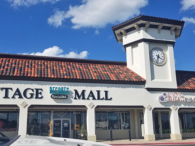 With its Spanish-inspired roof and stately clock tower, Decades Revisited looks less like a vintage mall and more like a time machine disguised as a building. 