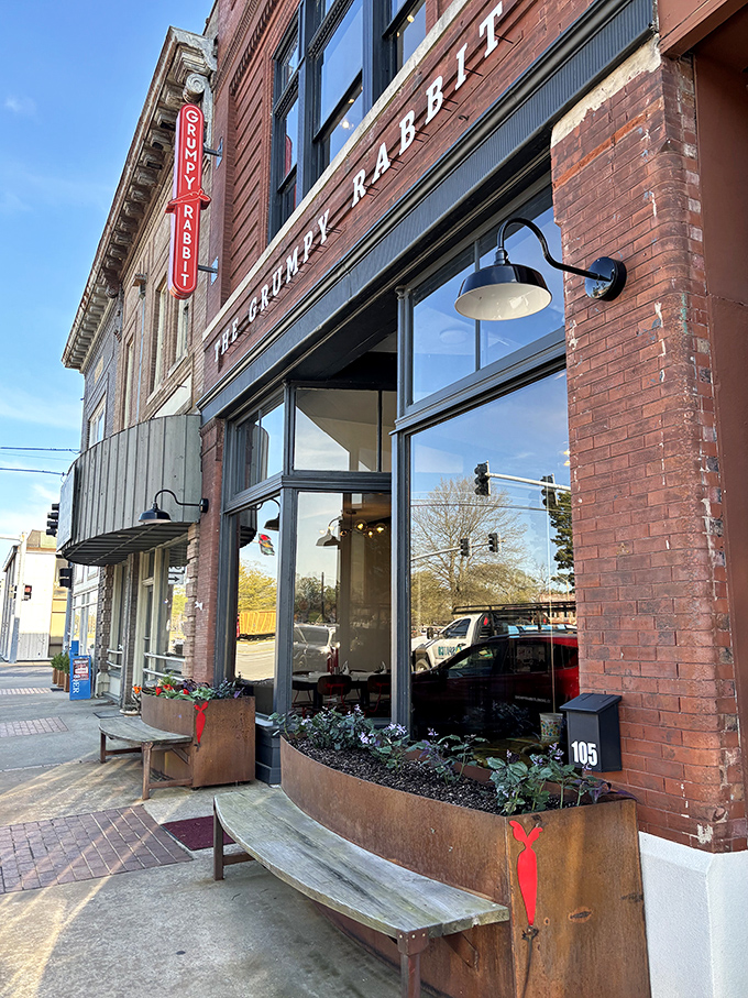 The historic brick fa&ccedil;ade of The Grumpy Rabbit welcomes you with flower boxes that say, "Yes, we're serious about beauty and food."