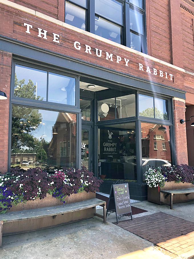 The historic brick fa&ccedil;ade of The Grumpy Rabbit welcomes you with colorful flower boxes that say, "Yes, we're serious about beauty and food."