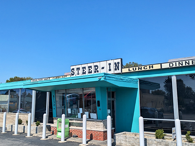 The turquoise-trimmed time machine beckons from East 10th Street, promising comfort food that actually comforts and conversations that matter.