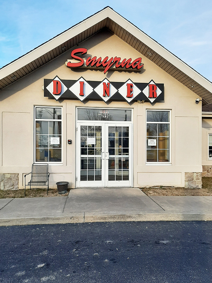 The classic diner silhouette of Smyrna Diner beckons hungry travelers like a lighthouse for comfort food enthusiasts navigating Route 13.