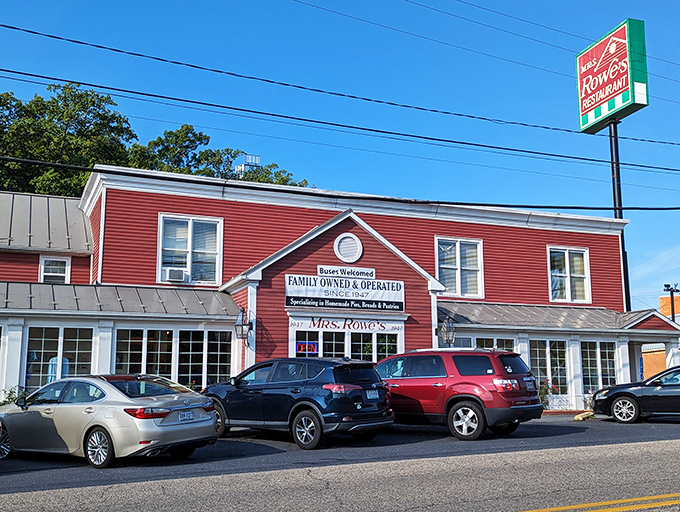 The iconic red exterior of Mrs. Rowe's stands like a beacon of comfort food hope along the highway, promising salvation for hungry travelers.