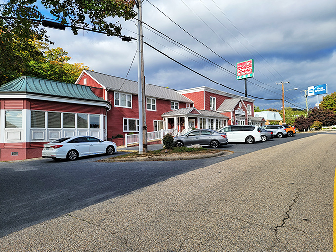 The iconic red exterior of Mrs. Rowe's stands like a beacon of comfort food hope along the highway, promising salvation for hungry travelers.