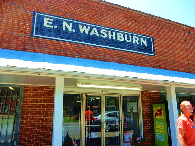 The iconic brick fa&ccedil;ade of E.N. Washburn's has stood sentinel since 1831, a time capsule of Americana waiting behind those welcoming doors.