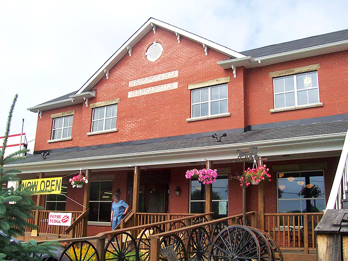 The white-columned porch and patriotic bunting aren't just for show&mdash;they're your first clue that authentic Americana awaits inside this red brick treasure.