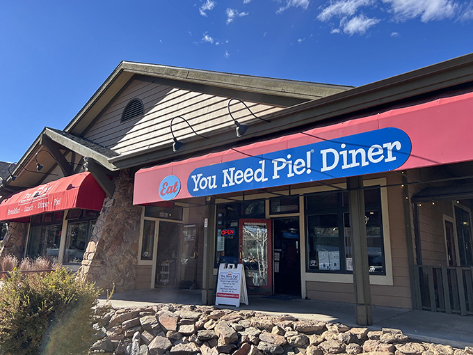 The bright red awning of You Need Pie! Diner isn't just inviting&mdash;it's making a bold statement about your immediate dietary requirements.