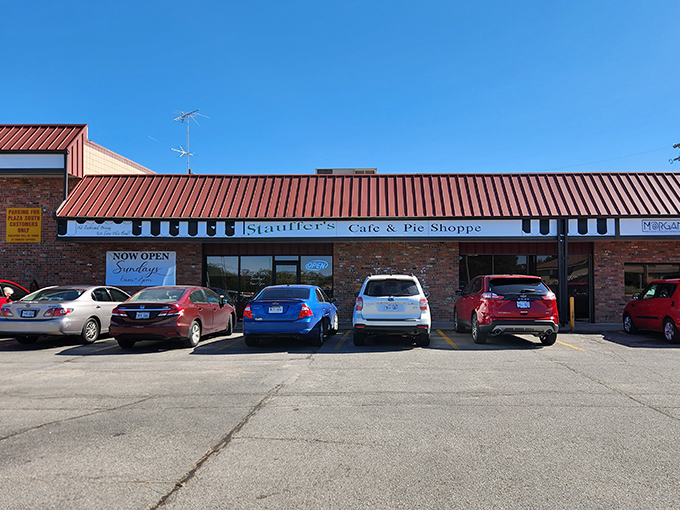 The pilgrimage begins here - a humble red-roofed brick building housing Nebraska's temple to pie perfection. Forget fancy facades; it's what's inside that counts.