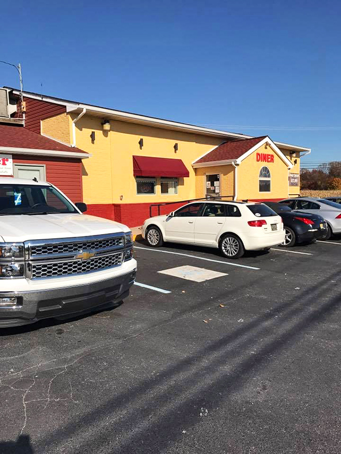 The sunshine-yellow exterior of Bear Diner stands as a cheerful beacon in Delaware, promising comfort food that feels like a warm hug.