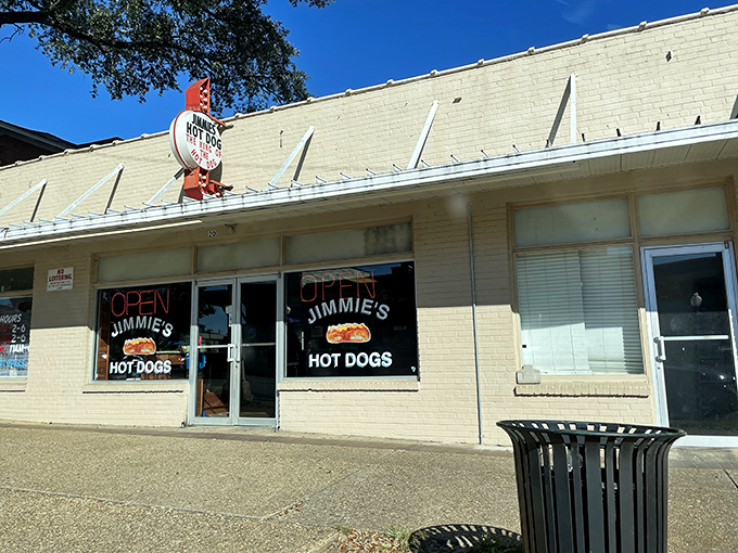 The unassuming exterior of Jimmie's Hot Dogs stands as a beacon of hope for hungry travelers &ndash; proof that culinary treasures often hide in plain sight.