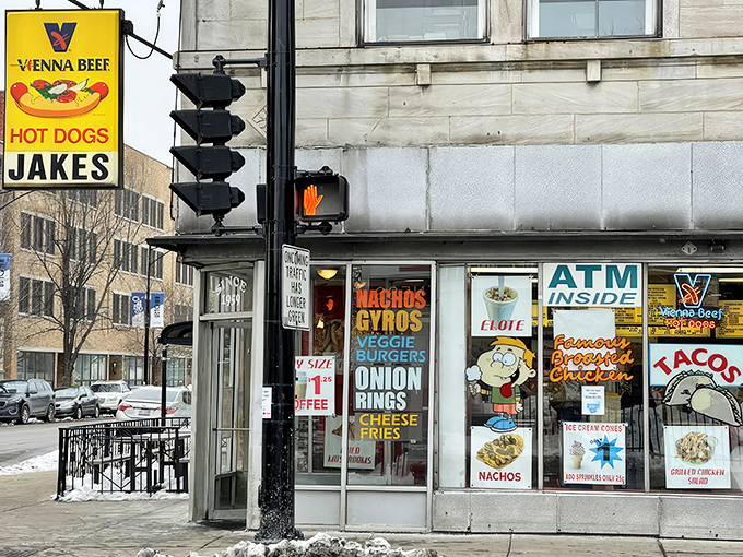 That iconic yellow Vienna Beef sign beckons like a lighthouse for the hungry, promising Chicago's most sacred culinary tradition lies within.