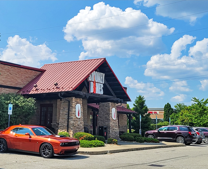 The barbecue beacon of Grove City stands ready to welcome hungry pilgrims with its rustic stone facade and signature red roof.