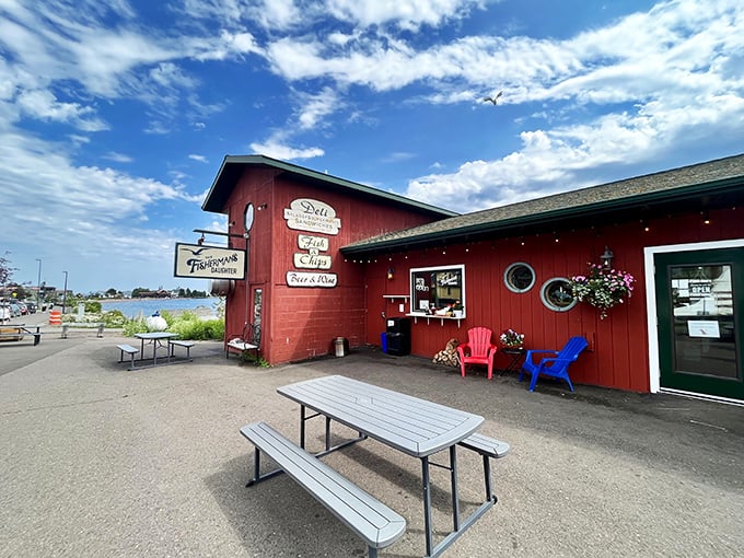 The little red fish shack that could! The Fisherman's Daughter stands proudly on Grand Marais' harbor, promising seafood treasures within its humble walls.