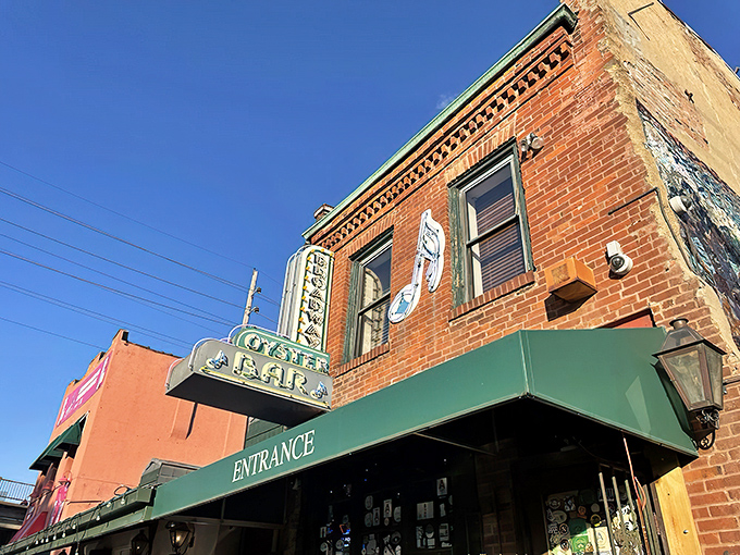 The historic red brick facade of Broadway Oyster Bar stands like a Cajun oasis amid downtown St. Louis, its weathered charm promising culinary adventures within. 