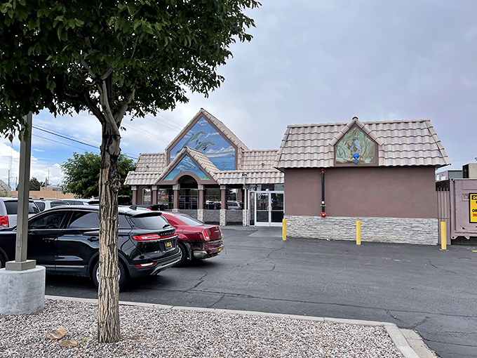 The iconic dolphin mural on Mariscos Altamar's exterior promises an ocean of flavor in the high desert. A seafood mirage that actually delivers.