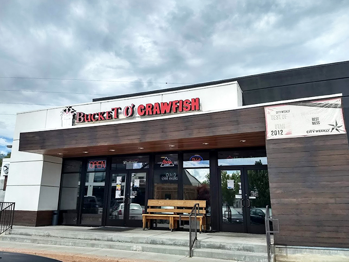 The unassuming exterior of Bucket O' Crawfish belies the seafood paradise within. Like finding Atlantis in a strip mall, but with better parking.