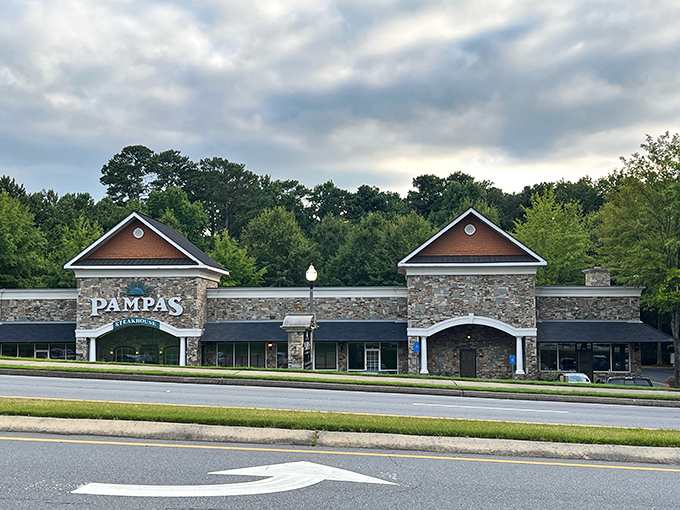 The stone facade of Pampas stands like a carnivore's cathedral in Johns Creek, promising meaty salvation within those unassuming walls.