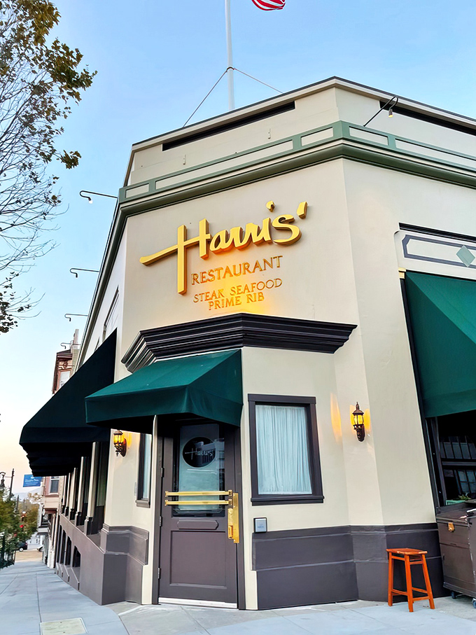 Harris' Restaurant glows with old-school charm at dusk, those signature green awnings beckoning like a carnivore's lighthouse in the San Francisco fog.