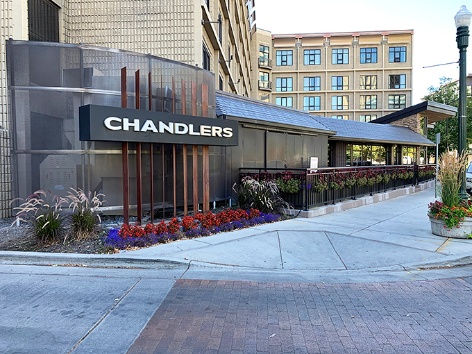 Chandlers' striking modern exterior stands like a beacon of culinary promise against Boise's skyline. The angular entrance practically whispers, "Important food decisions happen here."