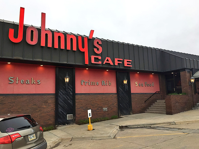 Johnny's bold red signage stands like a time machine in South Omaha, promising carnivorous delights that have satisfied generations of Nebraskans.