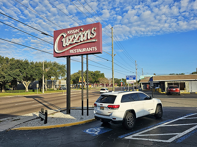 The iconic red Kissin' Cuzzins sign stands sentinel on 34th Street, a beacon of breakfast hope that's been guiding hungry St. Petersburg locals for decades.