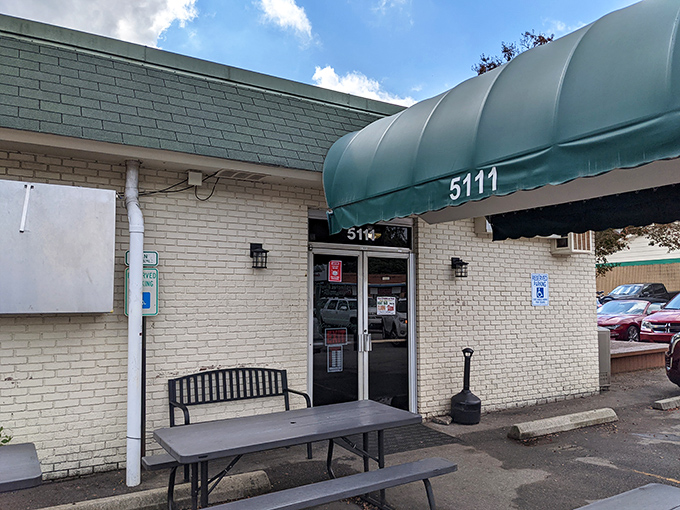 The unassuming exterior of Pam's Farmhouse hides culinary treasures within&mdash;proof that great breakfast joints never waste energy on flashy facades.