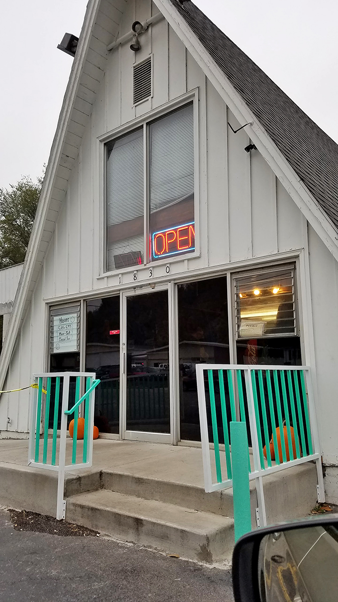 The iconic A-frame building of Mary Lou Donuts stands like a sugary lighthouse, beckoning carb enthusiasts from miles around.