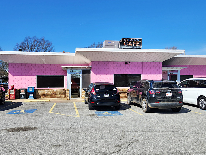 That pink exterior isn't just a building&mdash;it's a beacon of hope for hungry travelers seeking Southern comfort on a plate.