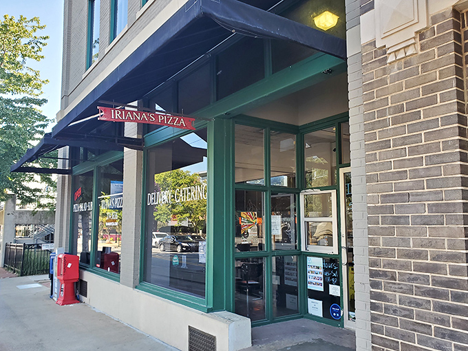 The unassuming storefront of Iriana's Pizza stands like a beacon of hope for hungry downtown Little Rock wanderers. Simple green frames, bold red sign&mdash;pizza paradise awaits.