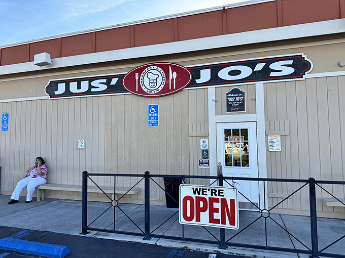 The unassuming exterior of Jus' Jo's Country Kitchen might not stop traffic, but locals know this modest building houses breakfast magic worth the drive.