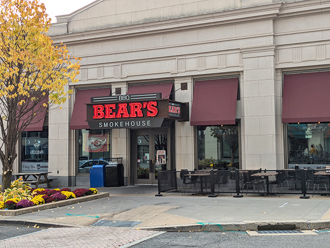 The glowing red sign of Bear's Smokehouse beckons like a barbecue lighthouse, guiding hungry souls through downtown Hartford to smoky salvation.