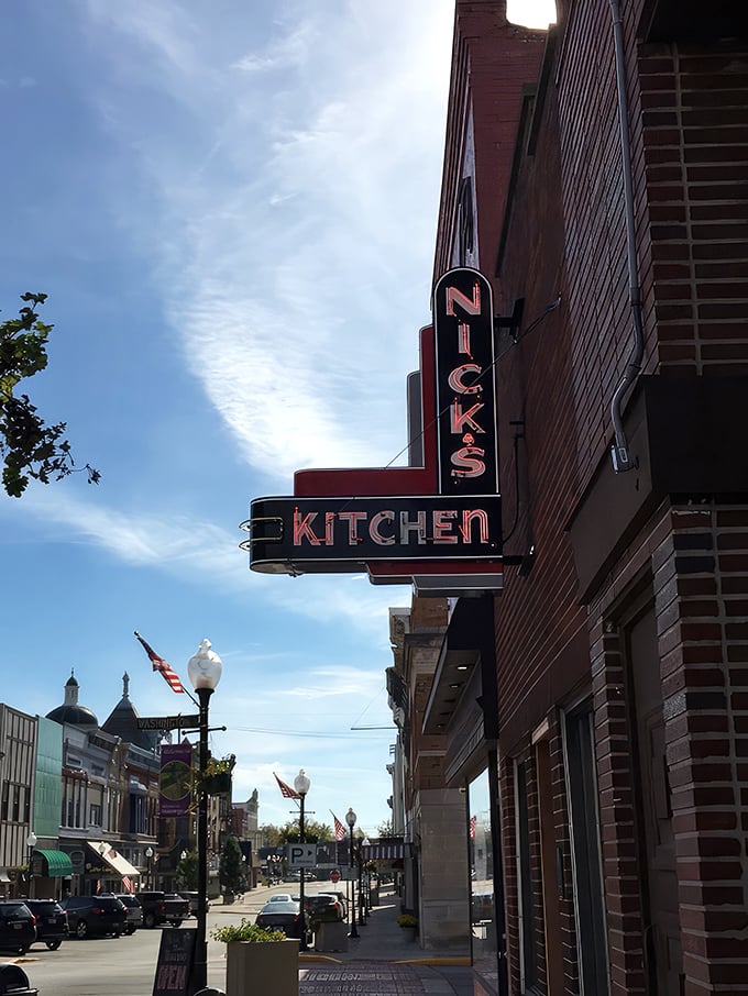 That classic neon sign against brick isn't just advertising &ndash; it's a beacon of hope for hungry Hoosiers seeking comfort food salvation.