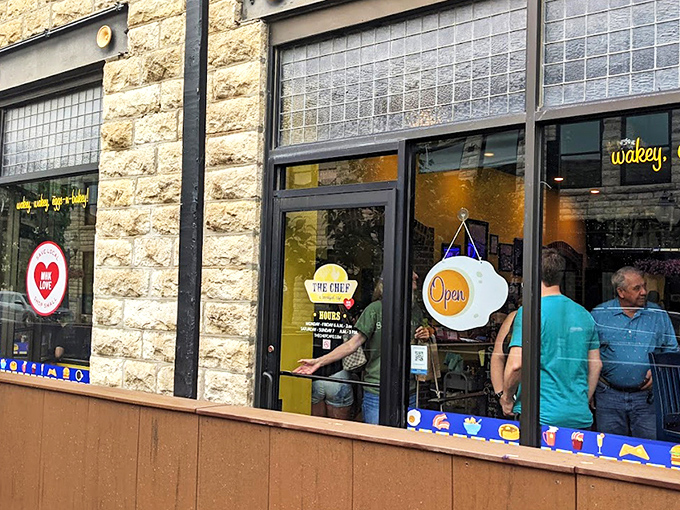 The limestone facade of The Chef welcomes hungry patrons with its cheerful egg-shaped "Open" sign&mdash;a promise of good things to come inside.