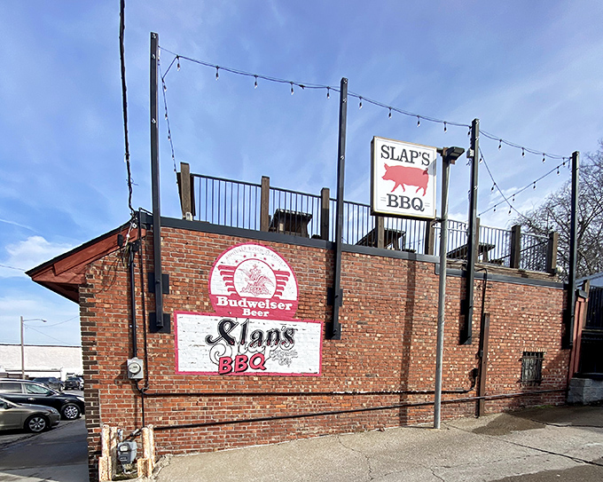 The brick fortress of flavor stands unassuming on a Kansas City corner, string lights hinting at the magic happening inside.