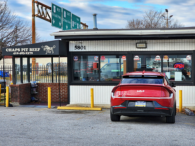 The unassuming exterior of Chaps Pit Beef &ndash; proof that culinary greatness often hides in plain sight, like a superhero's secret identity.