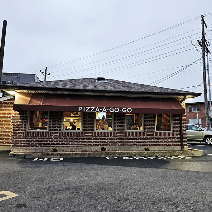The unassuming brick exterior of Pizza-A-Go-Go has been welcoming hungry St. Louisans since 1967, proving great pizza doesn't need flashy signage.