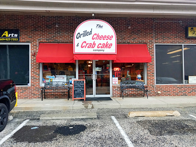 The unassuming storefront with its bright red awning promises comfort food nirvana. Sometimes the best treasures hide in plain sight.