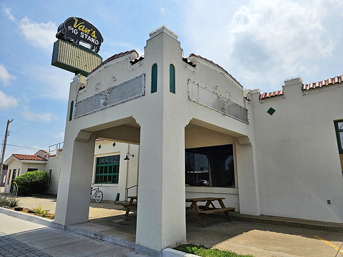 That iconic neon pig sign isn't just advertising &ndash; it's a beacon of hope for barbecue pilgrims seeking smoky salvation in Norman.