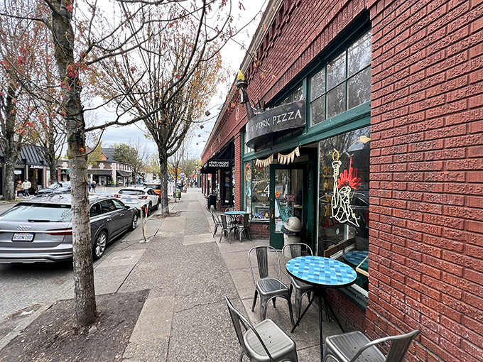The unassuming brick exterior of Escape from New York Pizza on NW 23rd Avenue promises zero pretension and maximum flavor.