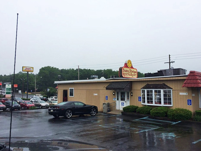 The red-roofed sanctuary of comfort food stands proudly on Route 61, its vintage sign and hex symbol beckoning hungry travelers like a Pennsylvania Dutch lighthouse.