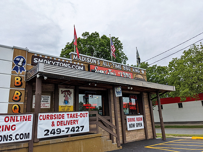 The unassuming exterior of Smoky Jon's proudly declares itself "Madison's All-Time BBQ King" &ndash; a bold claim backed by decades of smoke-infused excellence.