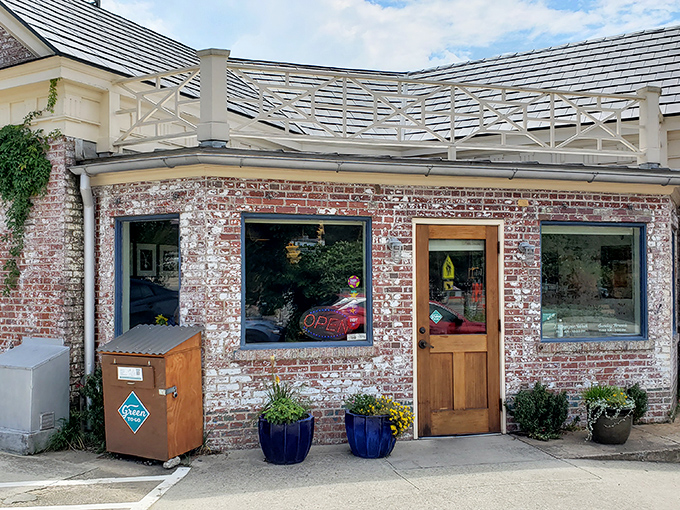 The unassuming brick exterior of Geer Street Garden, a former gas station transformed into Durham's deviled egg headquarters, welcomes visitors with blue flower pots and casual charm.